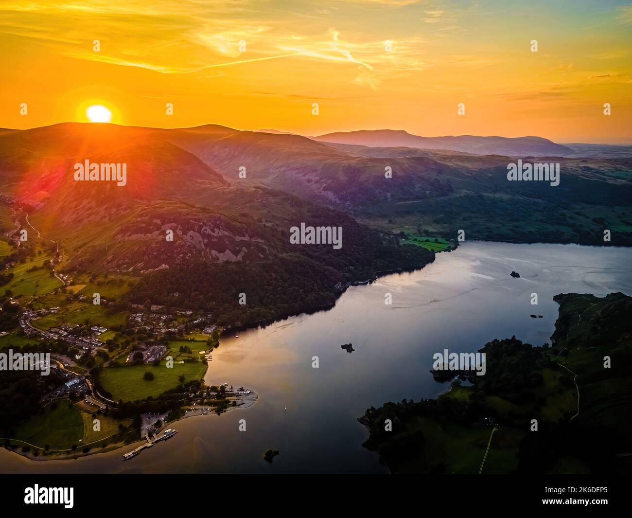 Aerial view of sunset over Ullswater lake in Lake District, a region ...