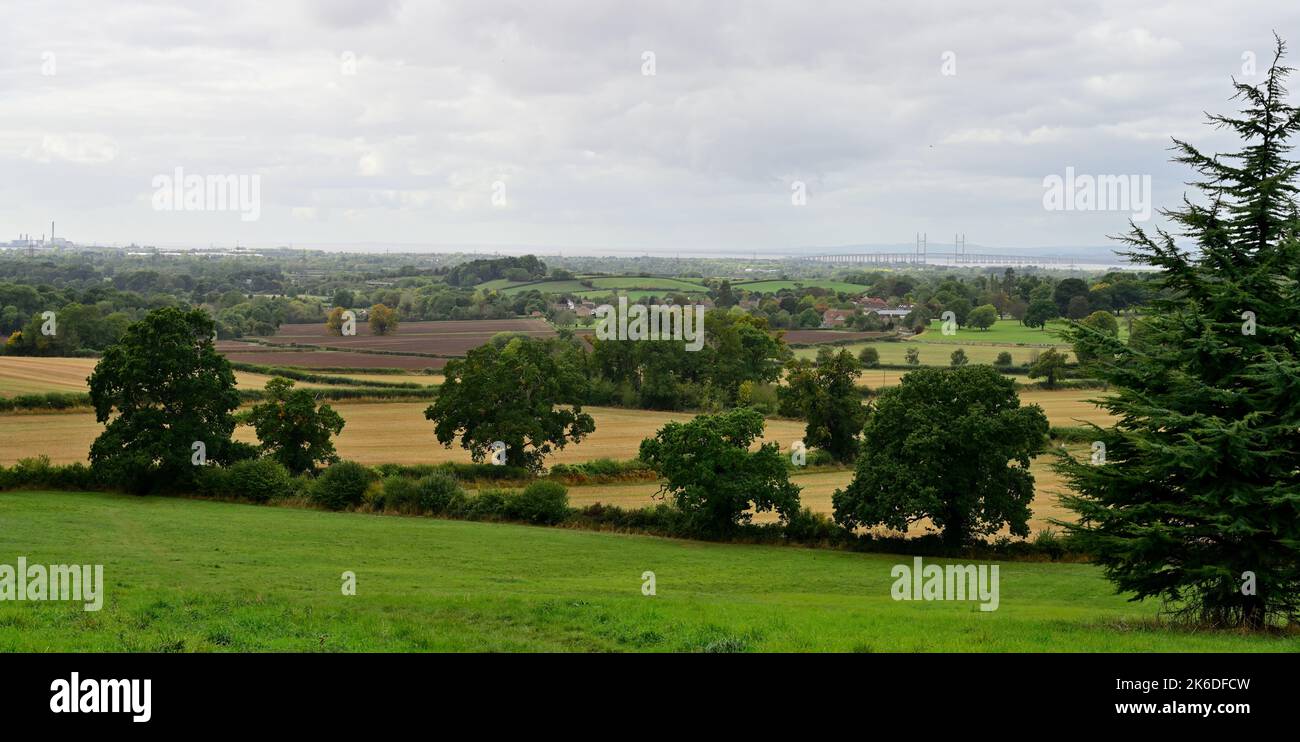 Looking over the flat landscape of Severn Valley toward the Aust bridge ...