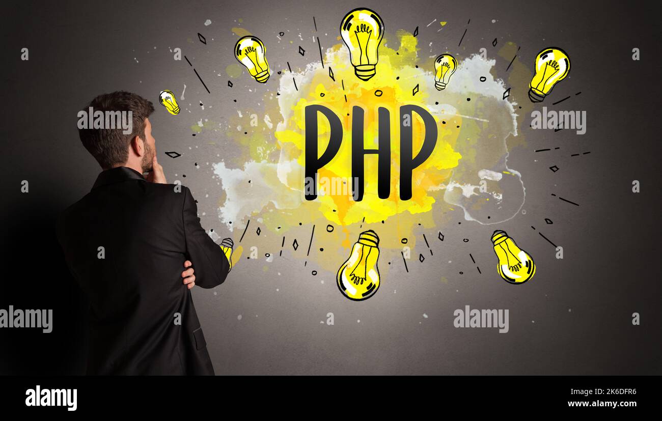 man drawing colorful light bulb Stock Photo - Alamy