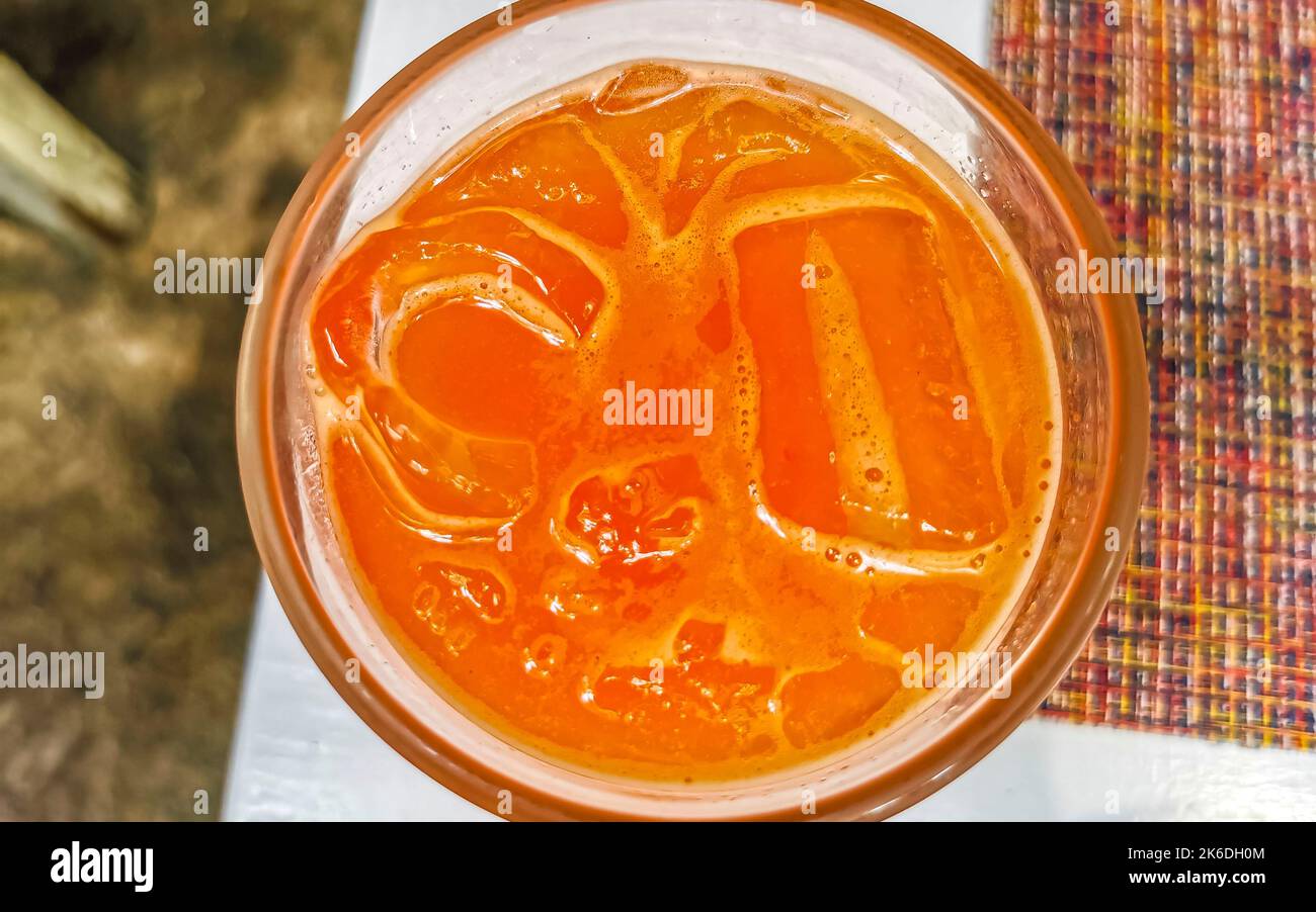 Glass of papaya fruit juice food and drink in the restaurant PapaCharly ...