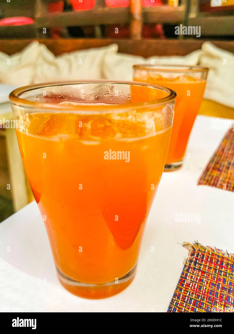 Glass of papaya fruit juice food and drink in the restaurant PapaCharly ...
