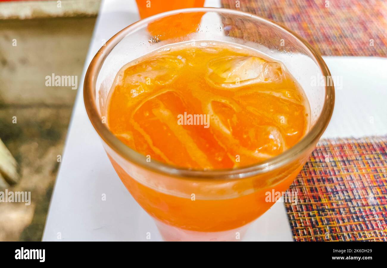 Glass of papaya fruit juice food and drink in the restaurant PapaCharly ...