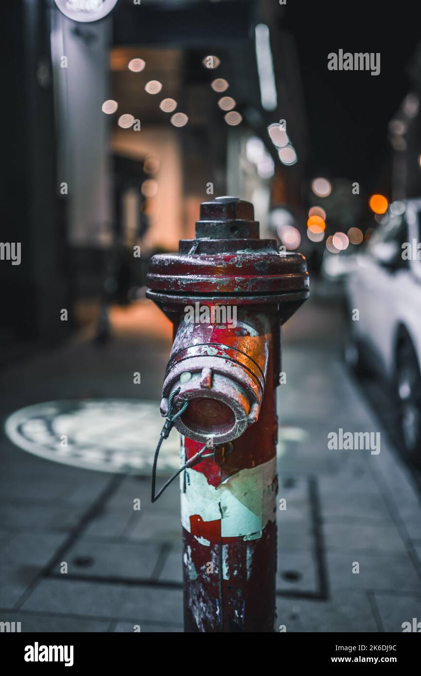 A vertical shot of a Fire hydrant at night in Budapest Stock Photo - Alamy