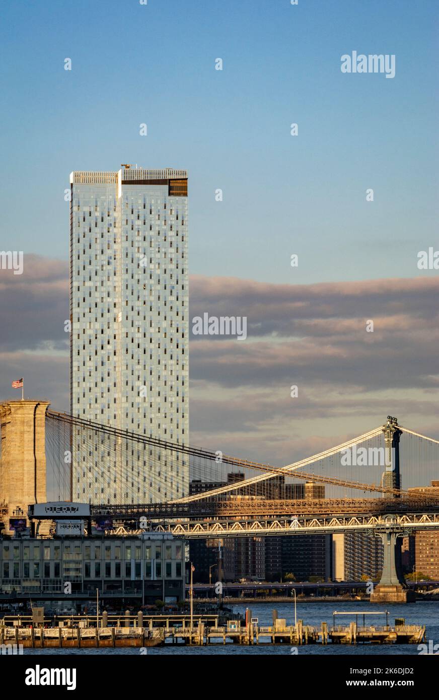 view from New York Harbor towards Brooklyn and Manhattan bridges and ...
