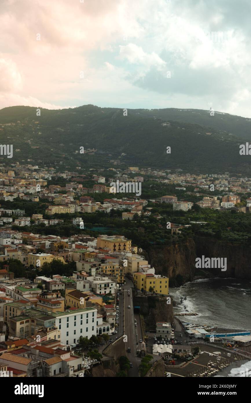 A vertical aerial view of the buildings on the coast of Positano, Italy ...