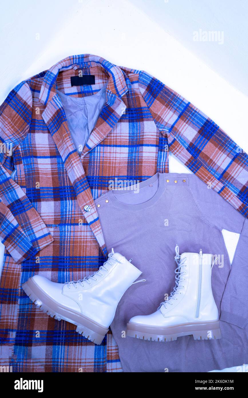 Flat lay, top view fashion style look with woman clothes and shoes ...