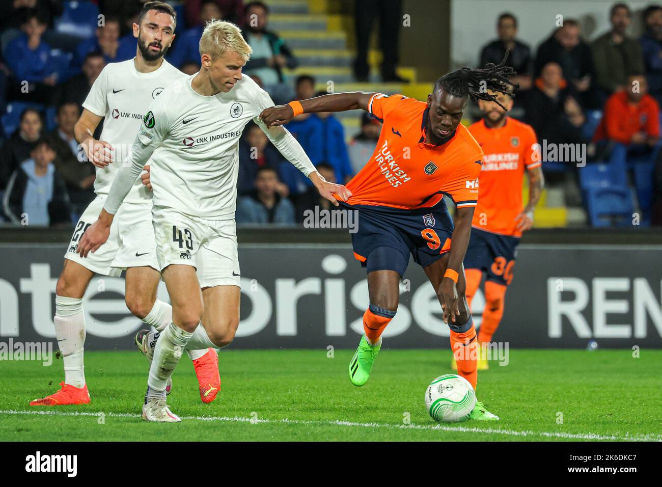 ISTANBUL, TURKIYE - OCTOBER 13: Ziga Lipuscek of RFS, Bertrand Traore ...