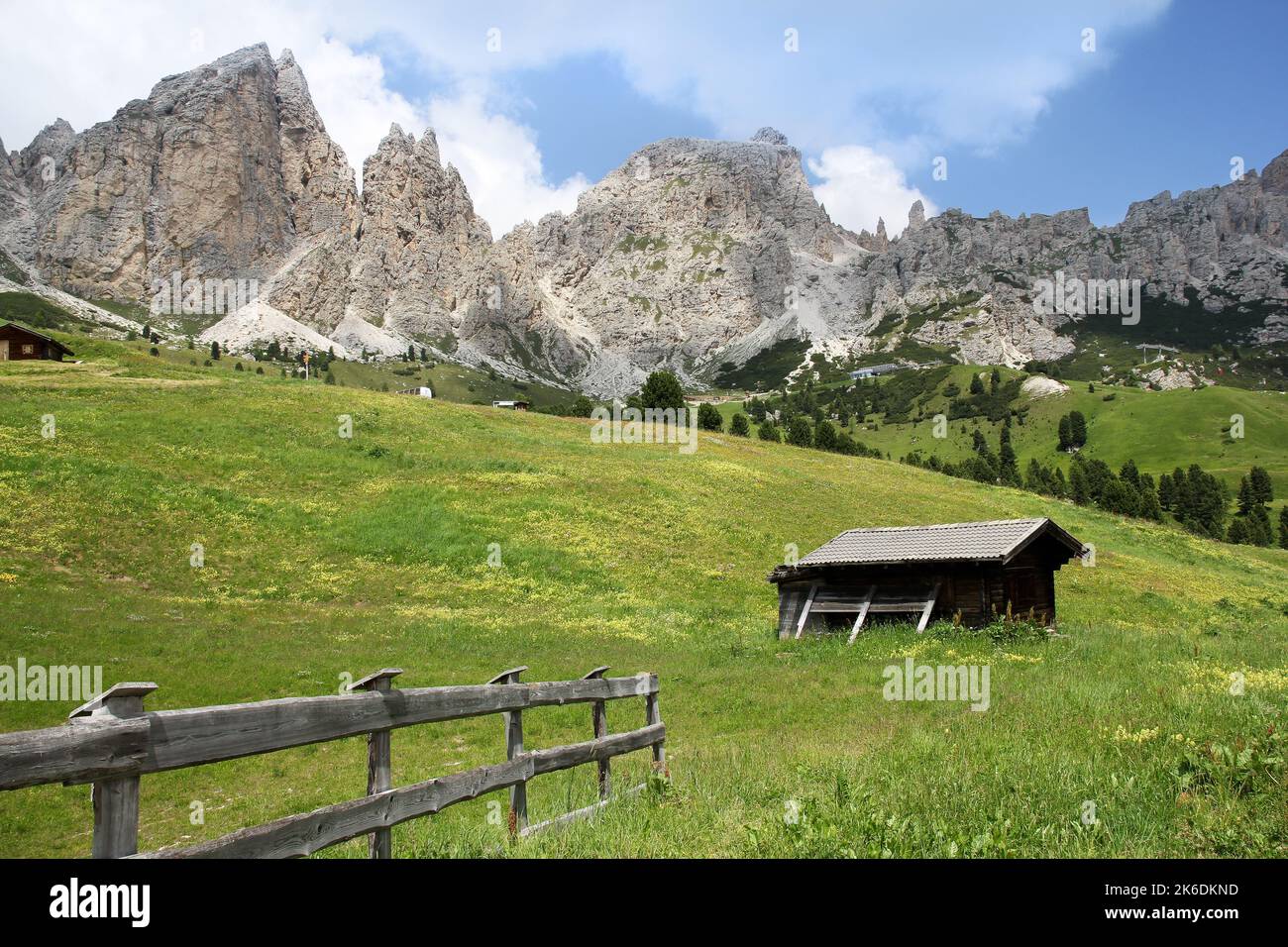 Barn at the height of Gardena Pass with Pizes de Cir at the background ...