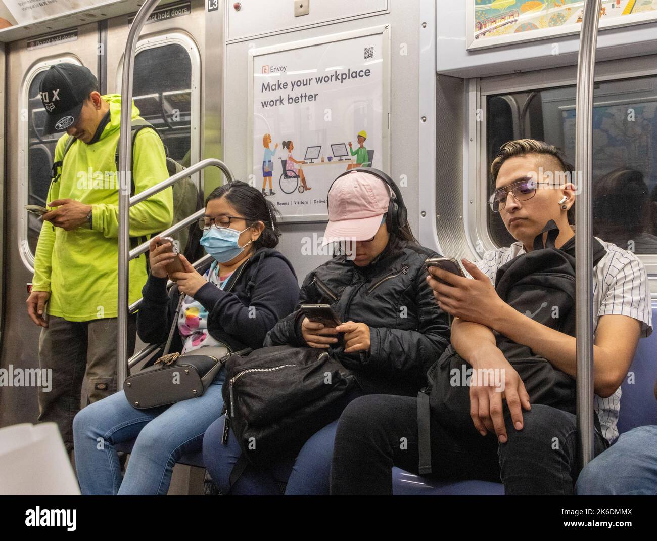 passengers immobile phones on the New York City subway, Manhattan, USA ...