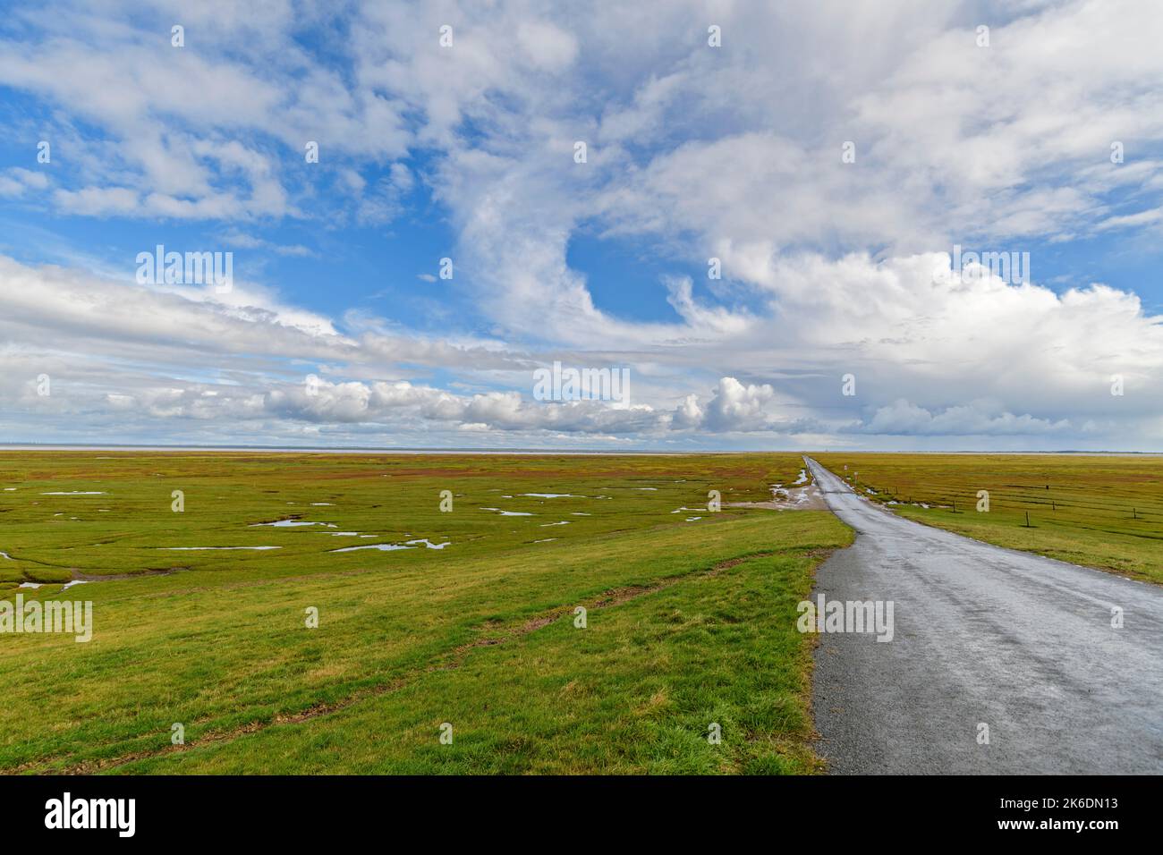 Landscape and road heading for the mainland at the tidal island of ...