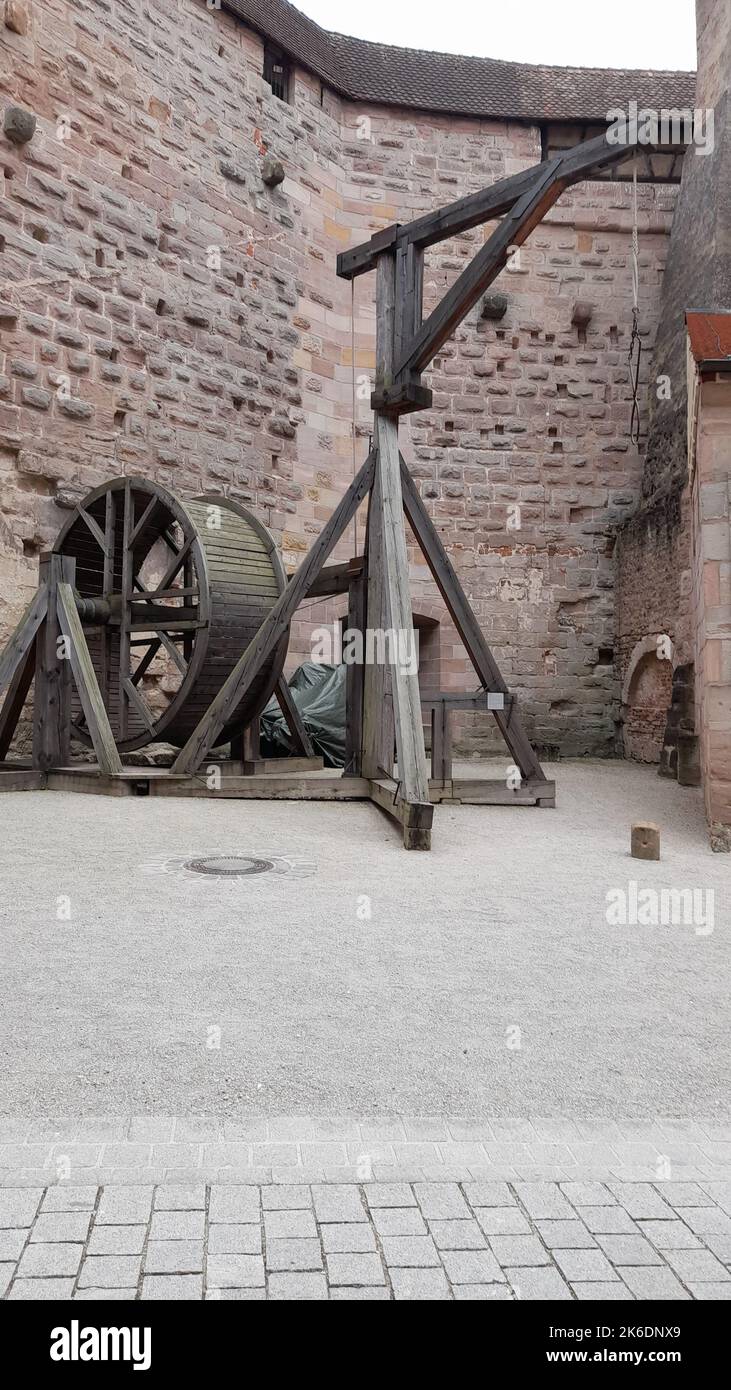 The gear wheel of medieval Cadolzburg Castle museum on cloudy sky ...