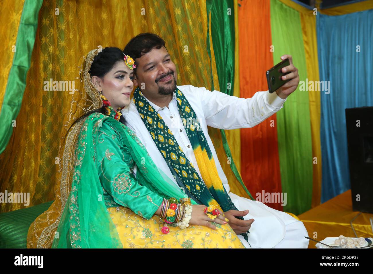 Bride and Groom taking selfie at Traditional Mayoon ceremony at ...