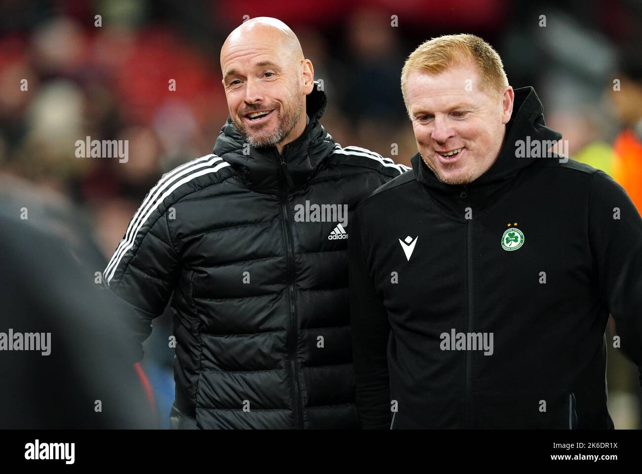Manchester United manager Erik ten Hag (left) and Omonia manager Neil ...