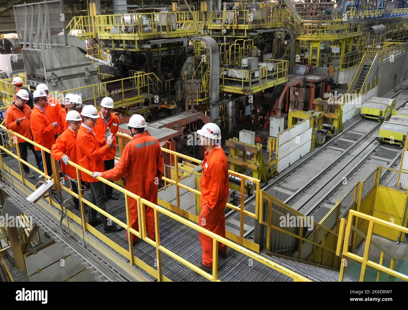 Canadian Prime Minister Justin Trudeau, centre, tours the ArcelorMittal Dofasco steel hot mill ...
