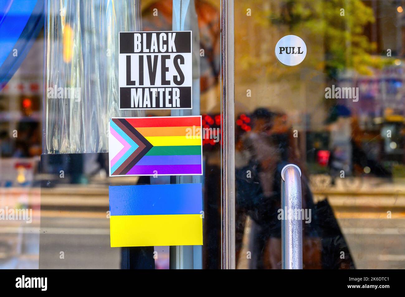 Business advocating three current causes. Stickers of Black Lives ...