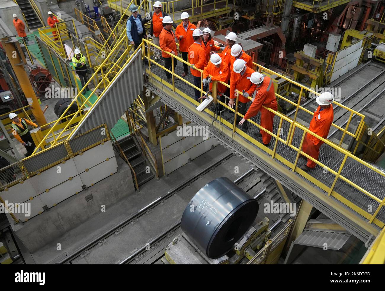 Canadian Prime Minister Justin Trudeau, centre, tours the ArcelorMittal Dofasco steel hot mill ...