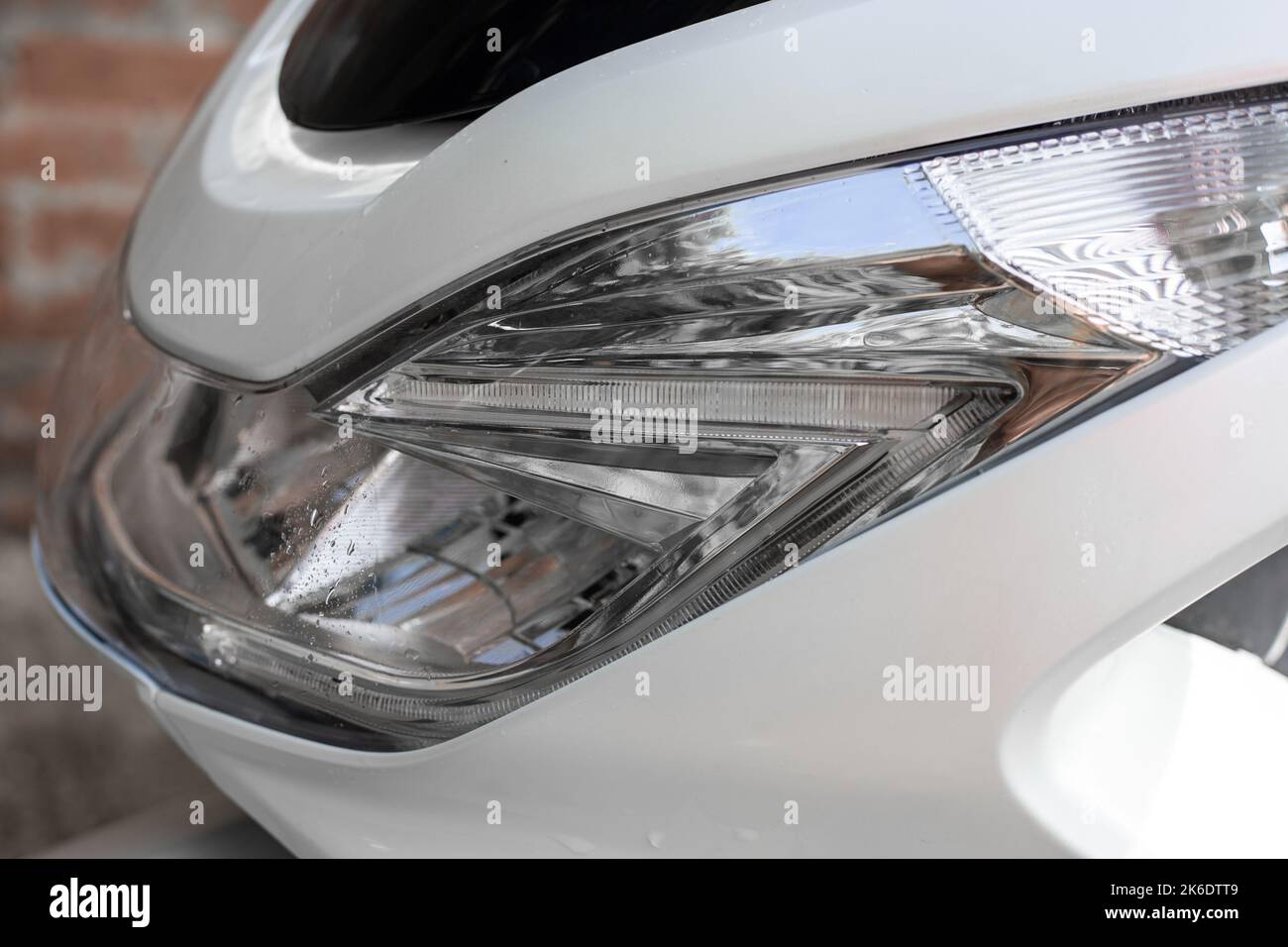 Front headlight with a windshield of a motorbike. Motorcycle, side view ...