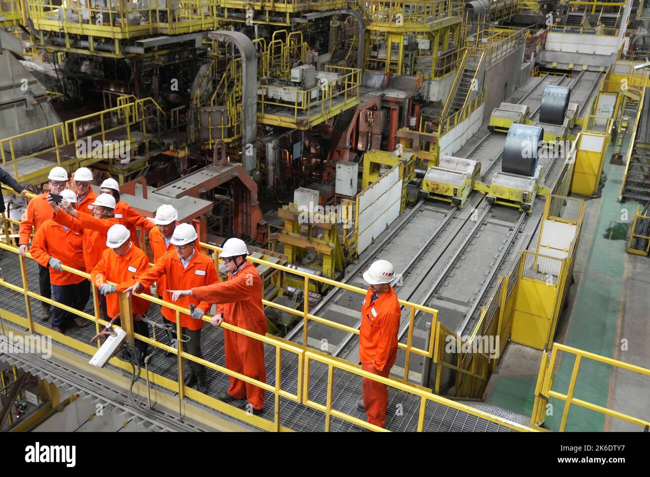 Canadian Prime Minister Justin Trudeau, centre, tours the ArcelorMittal Dofasco steel hot mill ...