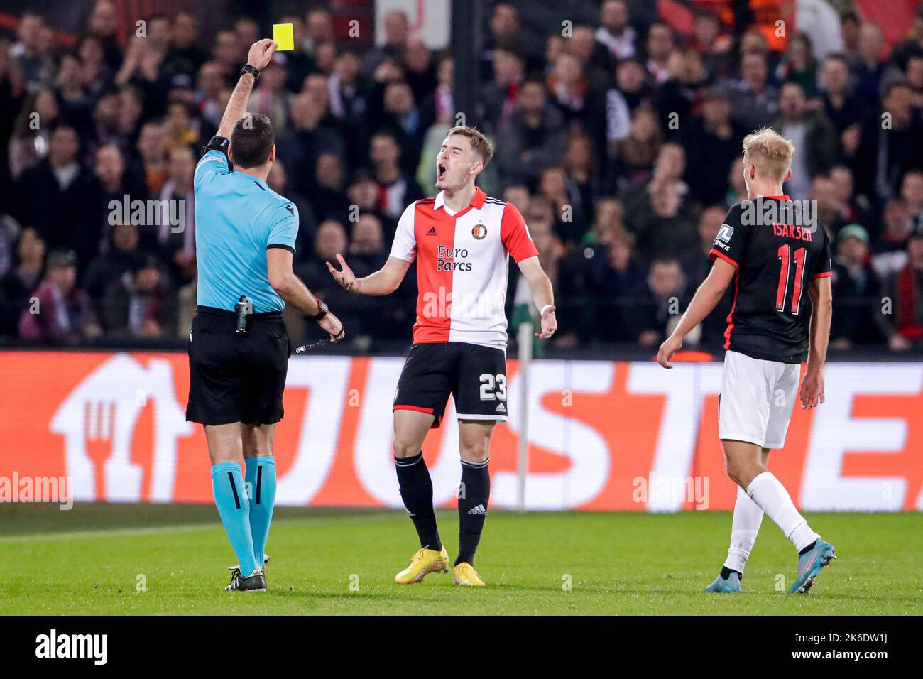 ROTTERDAM, NETHERLANDS - OCTOBER 13: Referee Rade Obrenovic shows ...