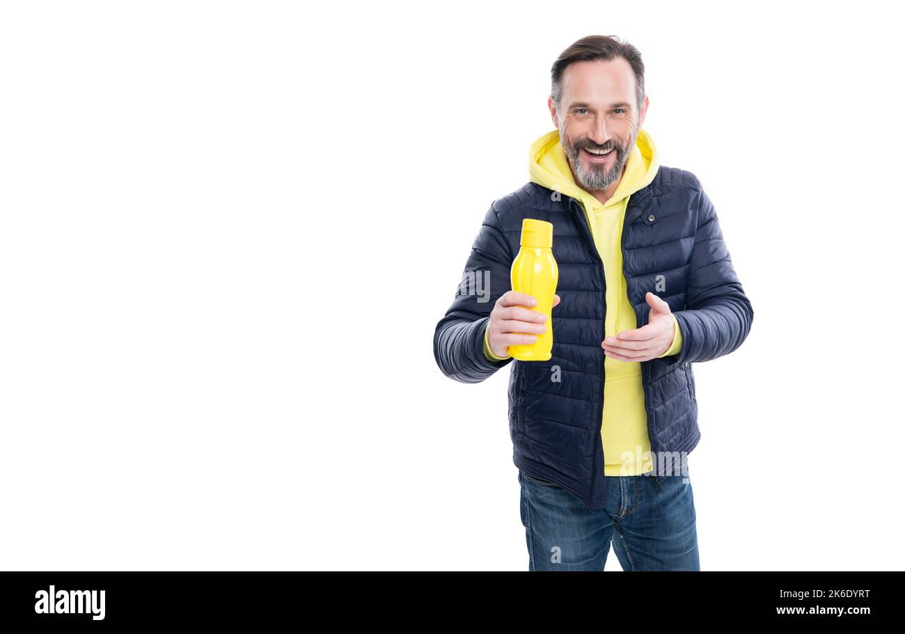 grizzled man presenting water bottle isolated on white background ...