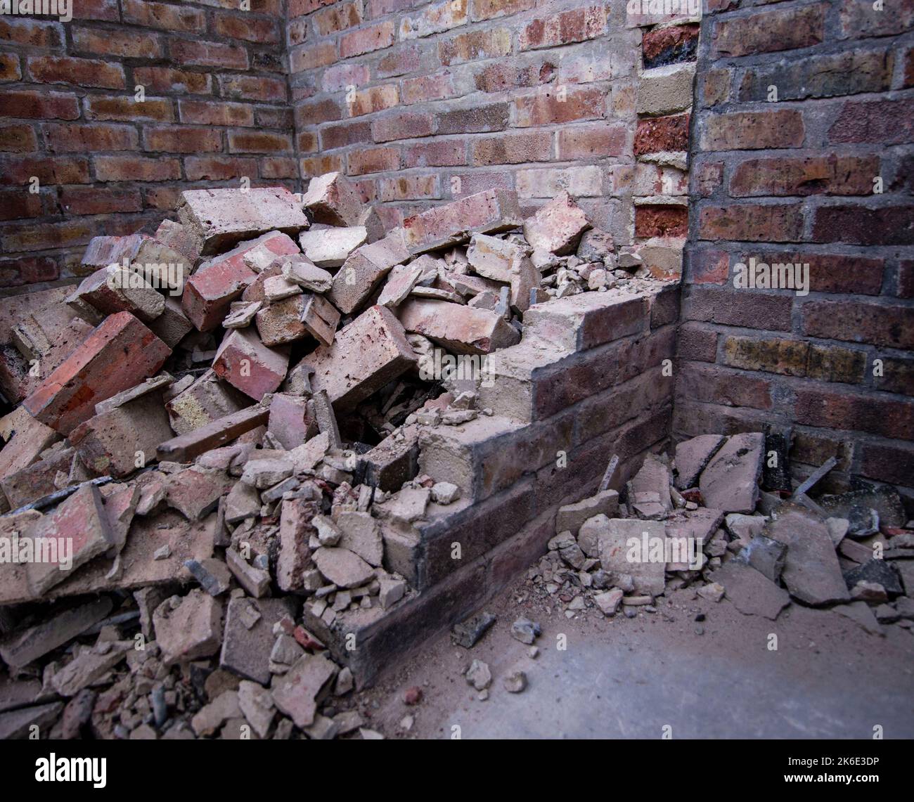 Rubble from building wall demolition Stock Photo - Alamy