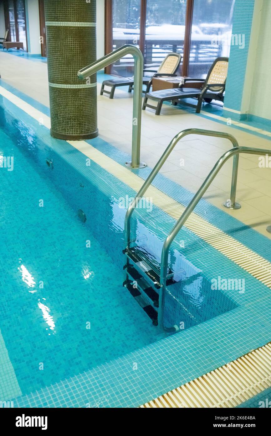 Pool ladder with stairs in empty pool for sport swimming training in ...