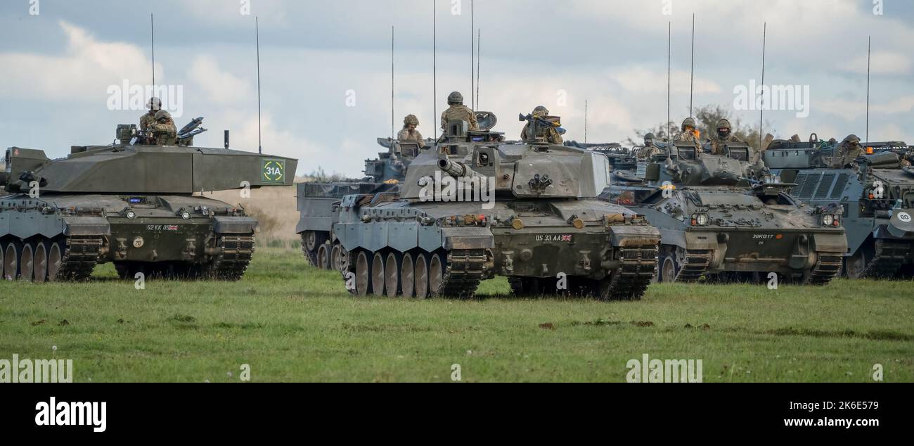 British army Challenger II 2 FV4034 main battle tank and Warrior FV510 fighting vehicles in ...