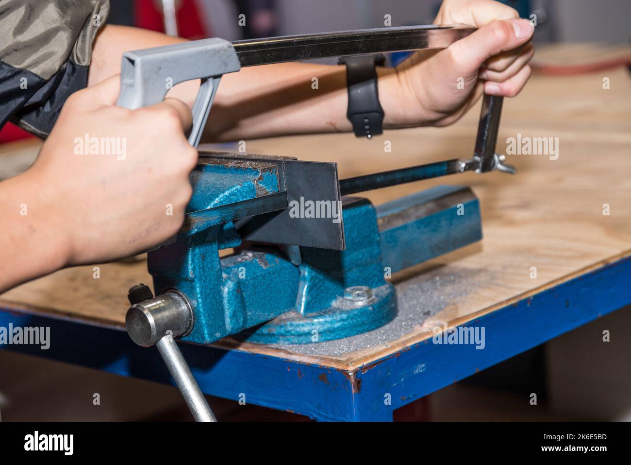 Metal Hacksaw For Sawing Metal Pieces By Hand - Craftsman With Metal ...