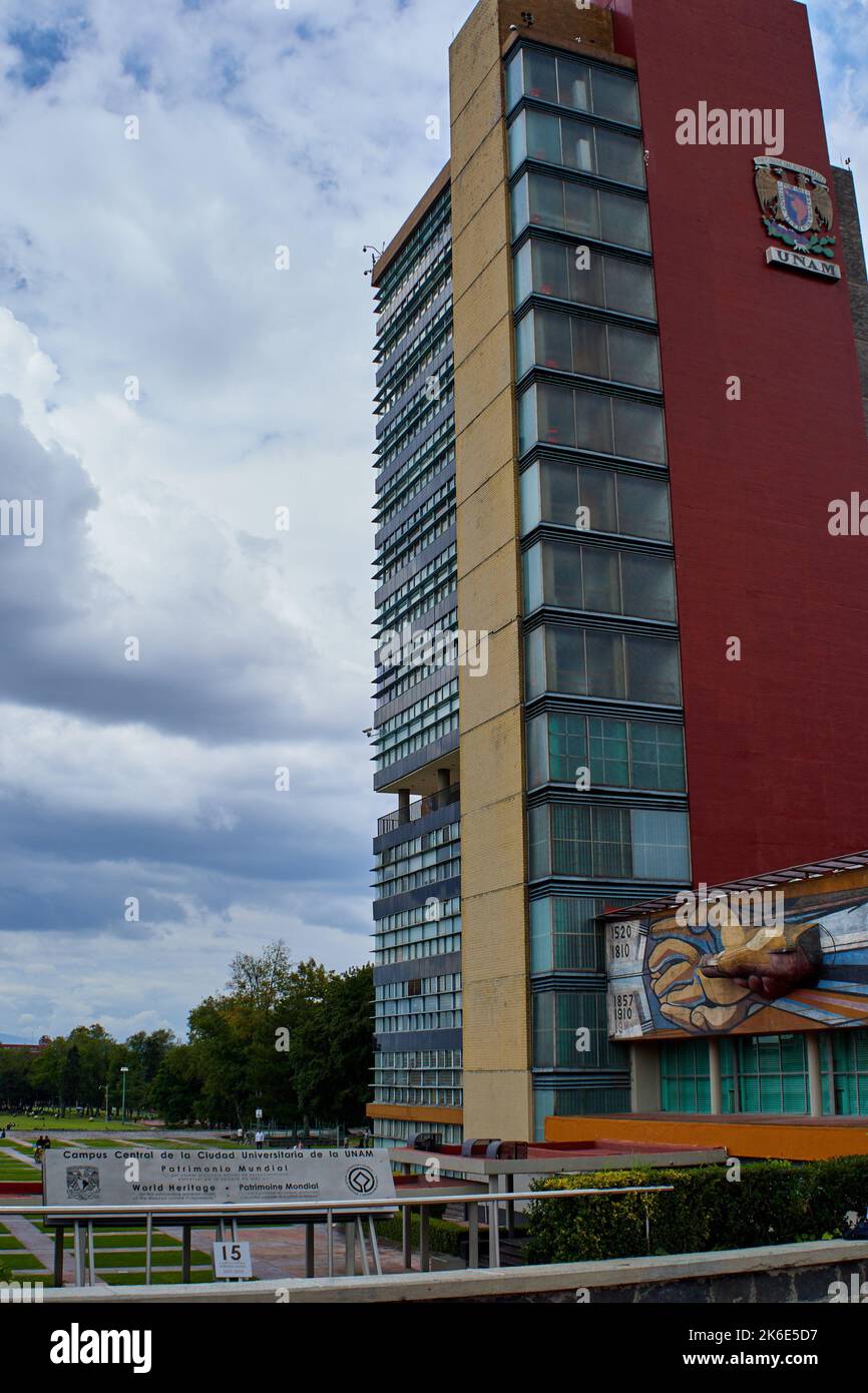 A vertical shot of the campus of the UNAM university with a modern red ...
