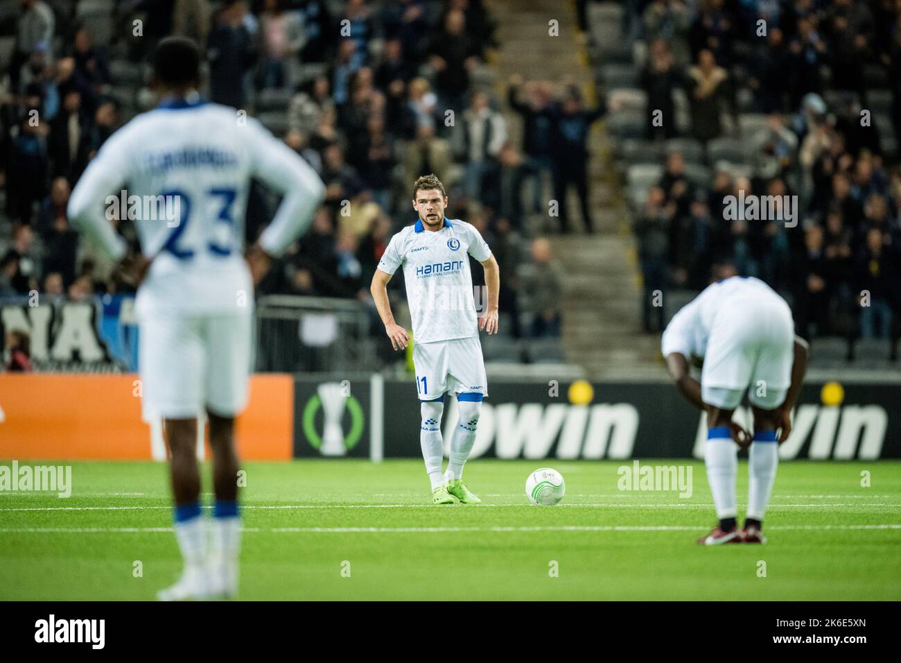 Stockholm, Sweden, 13 October 2022, Gent's Jordan Torunarigha and Gent's Hugo Cuypers look ...