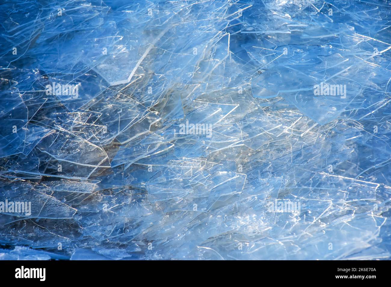 Winter background of the icy surface of the river. Texture of ice ...