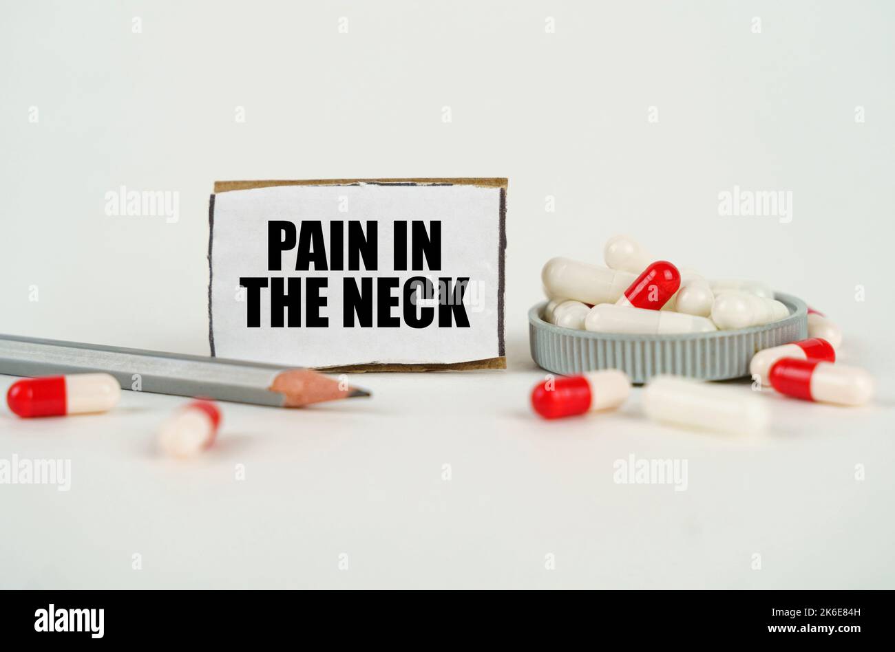 Medical concept. On a white background, medical capsules, a pencil and ...