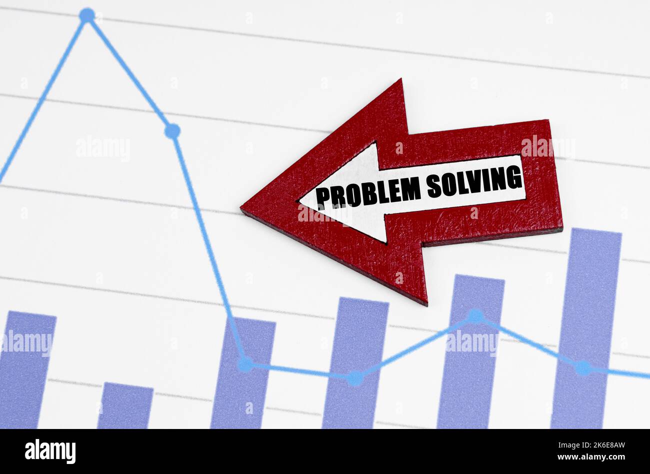 Business concept. On the reporting chart there is an arrow with the ...