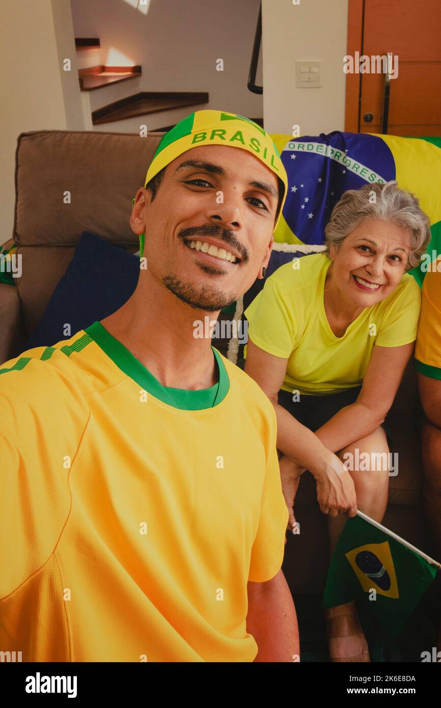 Brazilian Mixed Race Family Celebrating the cup in the living room ...
