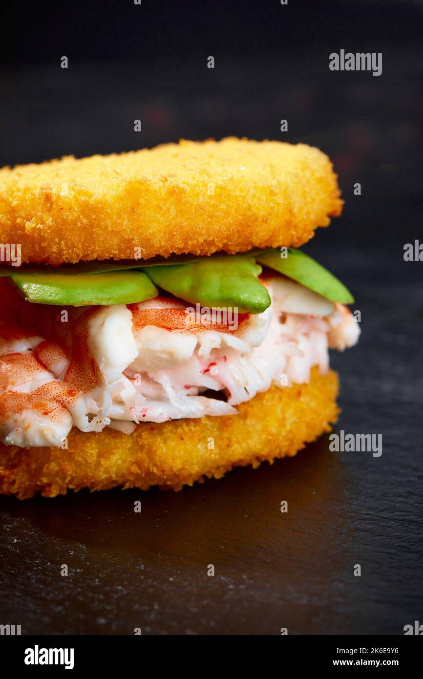 Pan-Asian cuisine concept. Japanese sushi burger made from rice bread ...