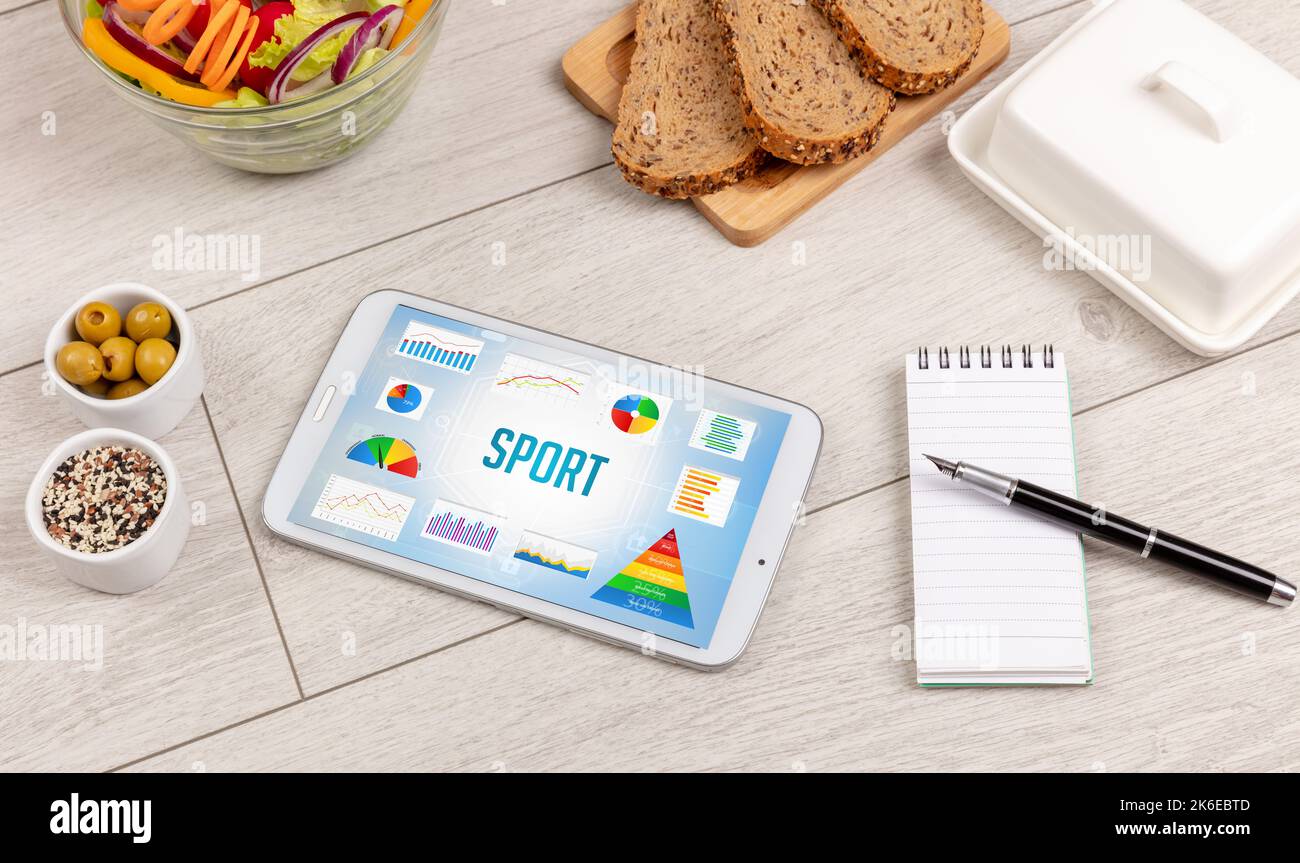 Organic food and tablet pc Stock Photo - Alamy