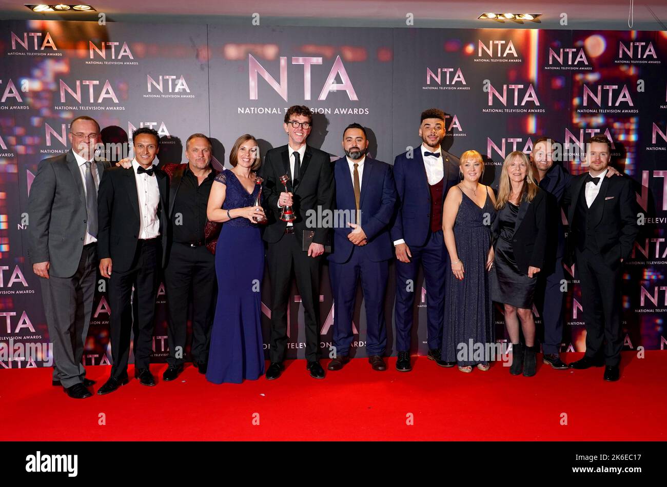 Mark Charnock (centre left) and the cast and crew of Emmerdale in the ...