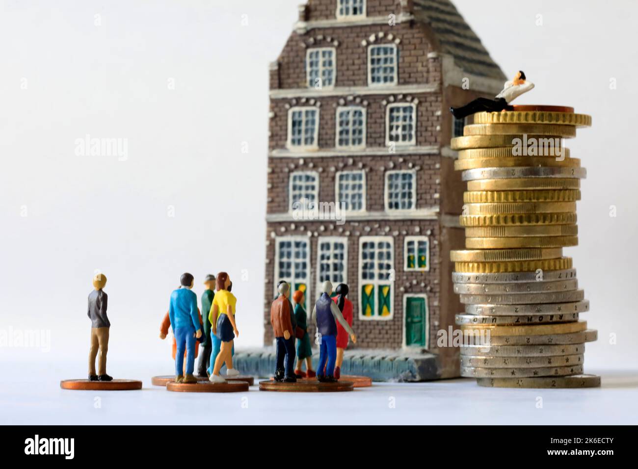 Illustrated image of a group of people all interested in buying a house ...