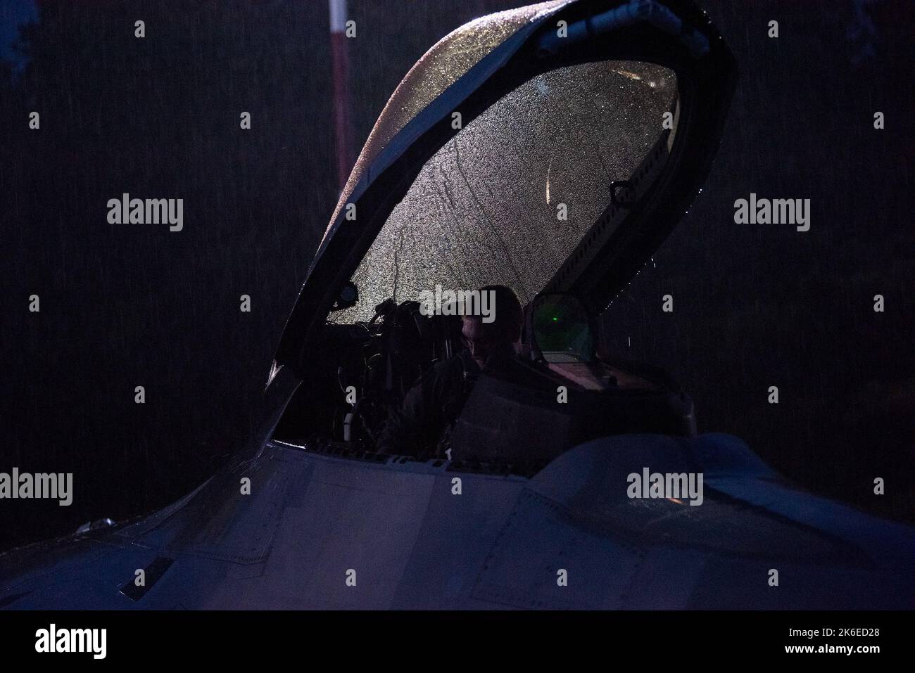 A U.S. Air Force F-22 Raptor pilot assigned to the 90th Expeditionary ...