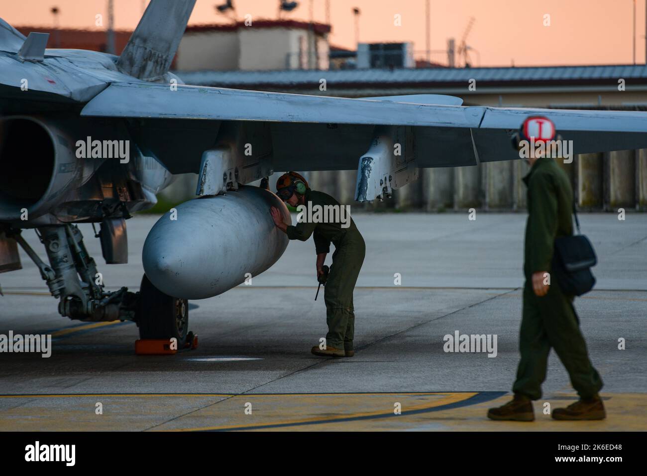 United States Marine Corps F/A-18 fixed-wing aircraft mechanics prepare ...