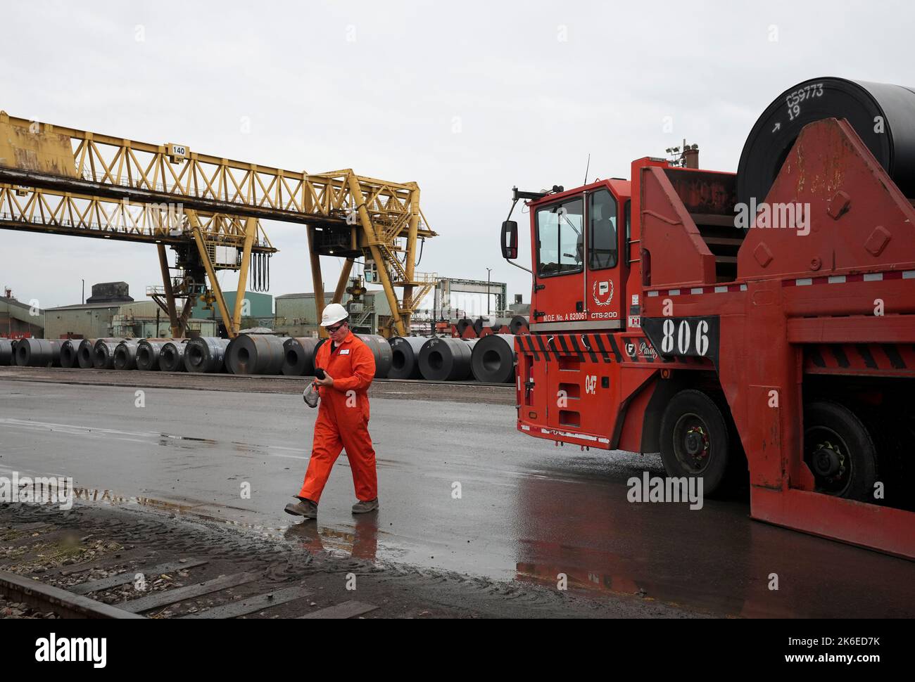 An employee at ArcelorMittal Dofasco, a manufacturer of hot rolled steel coils, parks a truck at ...