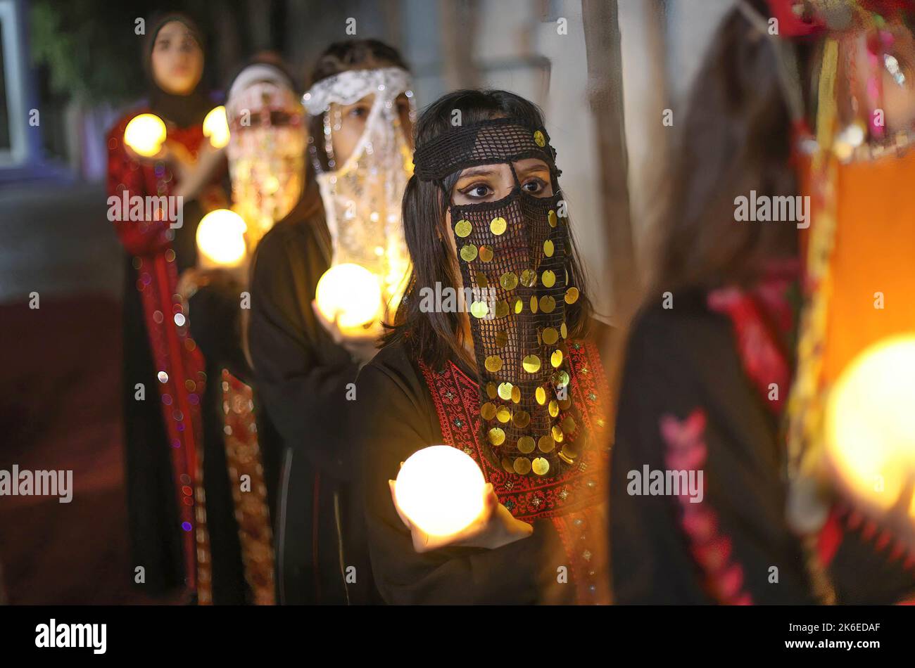 Gaza, Palestine. 13th Oct, 2022. Palestinian girls take part during the ...