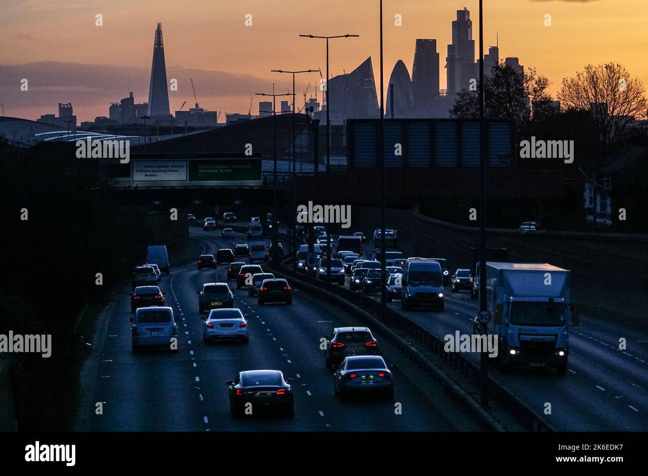 Traffic on A12 road with City of London skyscrapers in the background ...