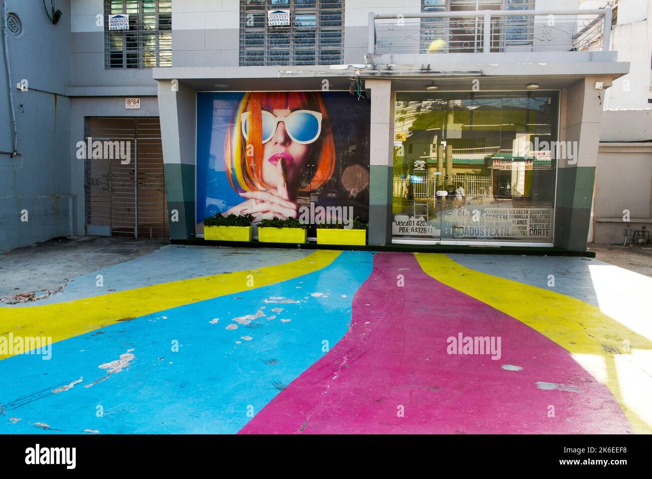 Cartagena, Colombia, colorful pavement, shopfront window Stock Photo ...