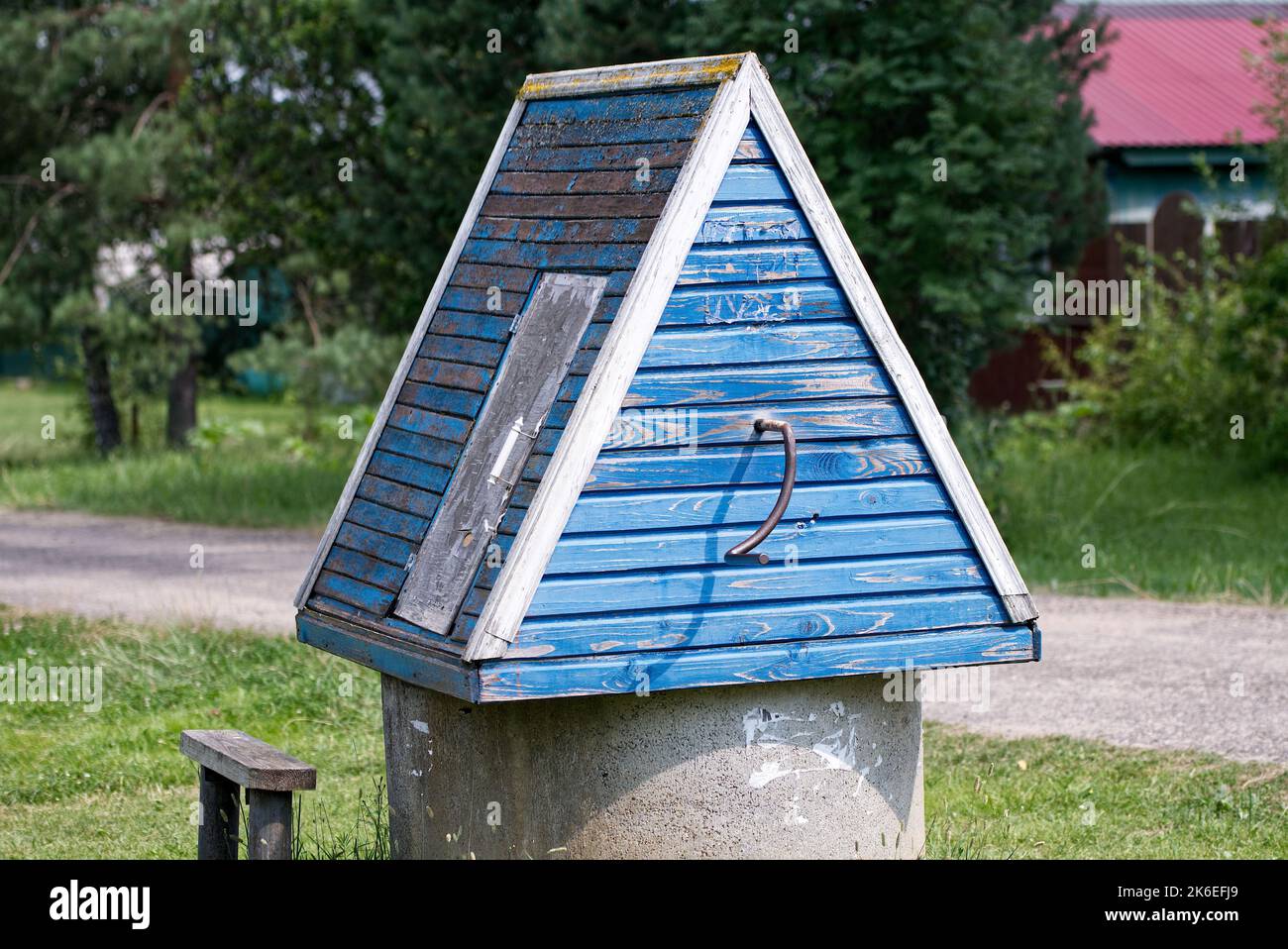 A beautiful view of a small decorative house in a garden with fresh ...