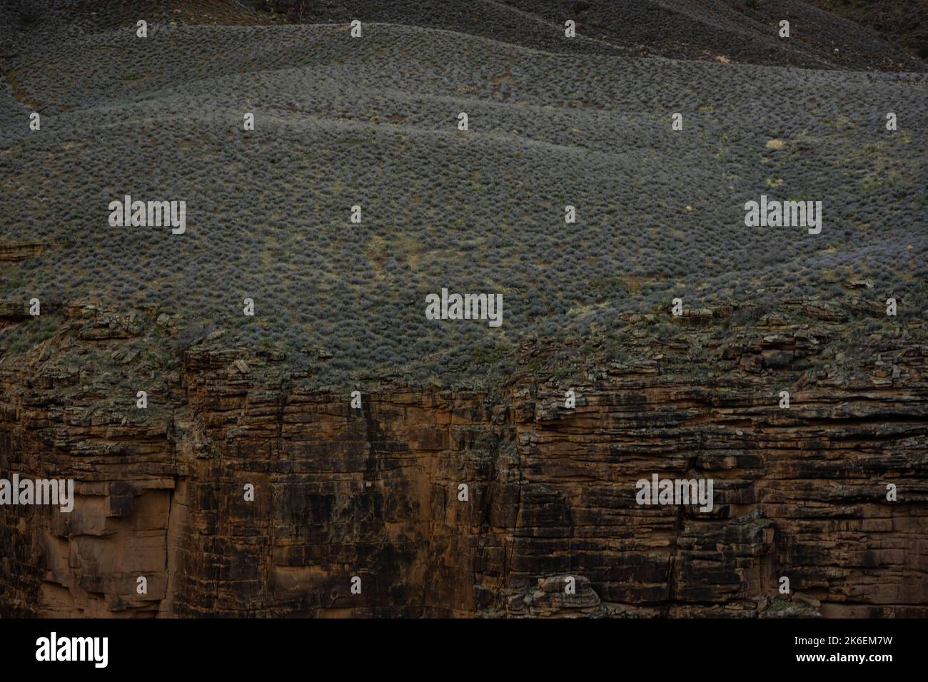 Rolling Sage Covered Hills Drop Off Cliff Into Grand Canyon from the ...