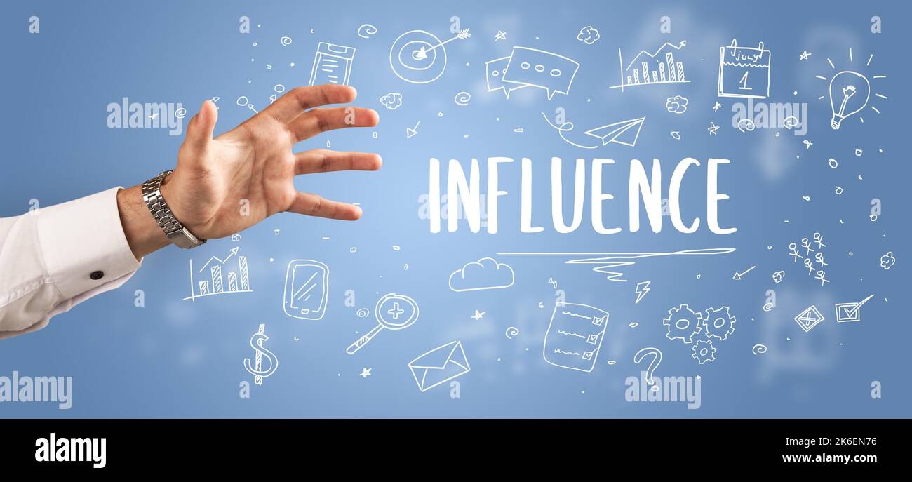 Close-Up of cropped hand pointing at business inscription Stock Photo ...