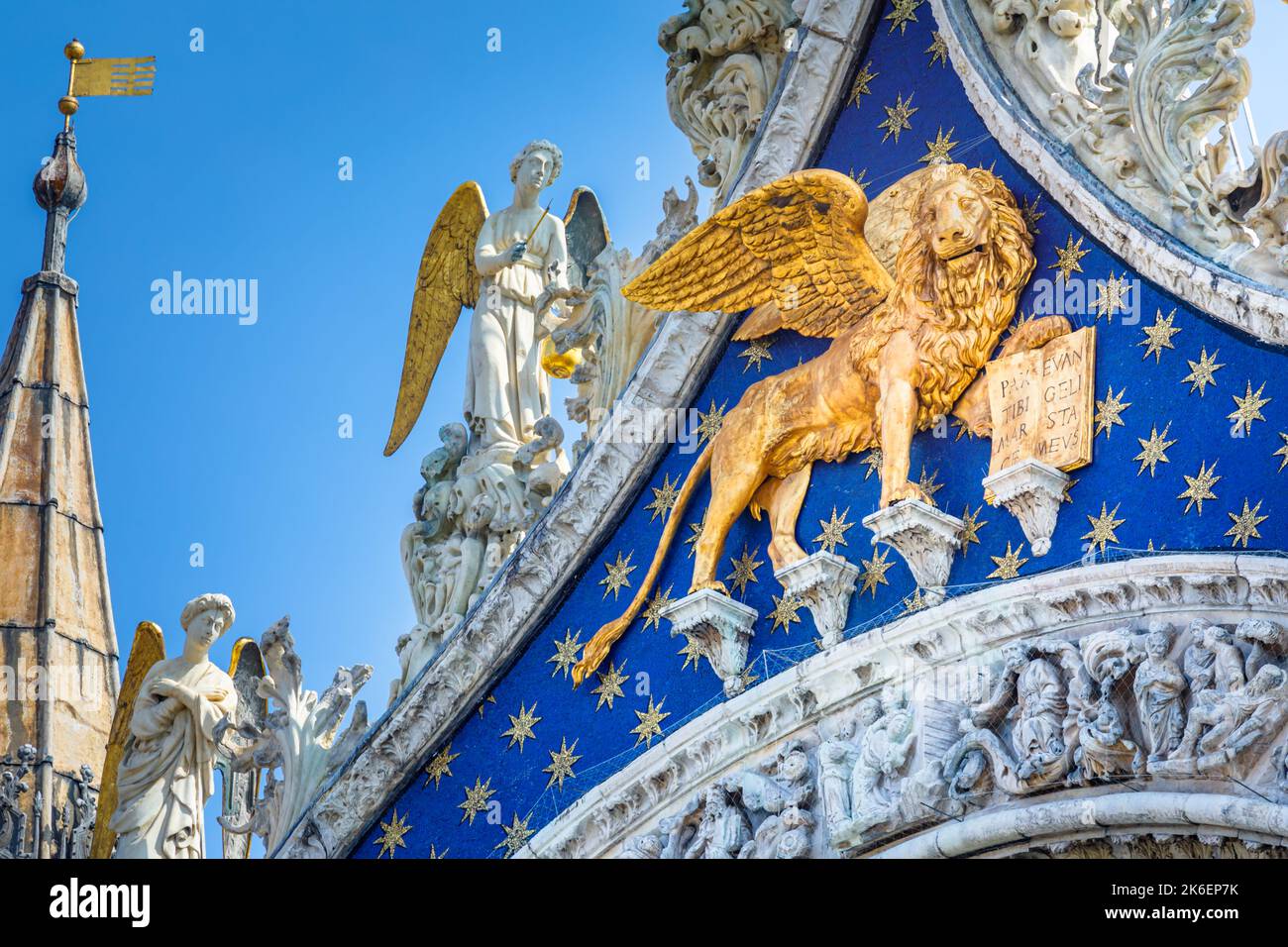 St Mark Basilica facade detail, with lion and angels, Venice, Italy ...