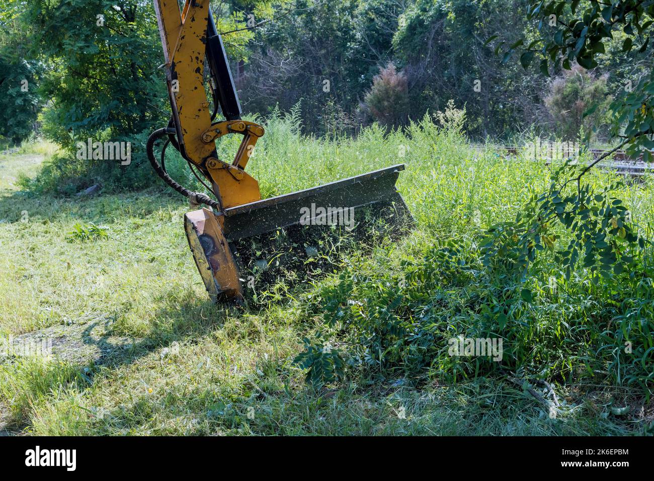 Tractor external equipment mechanization machine mower grass driving on ...