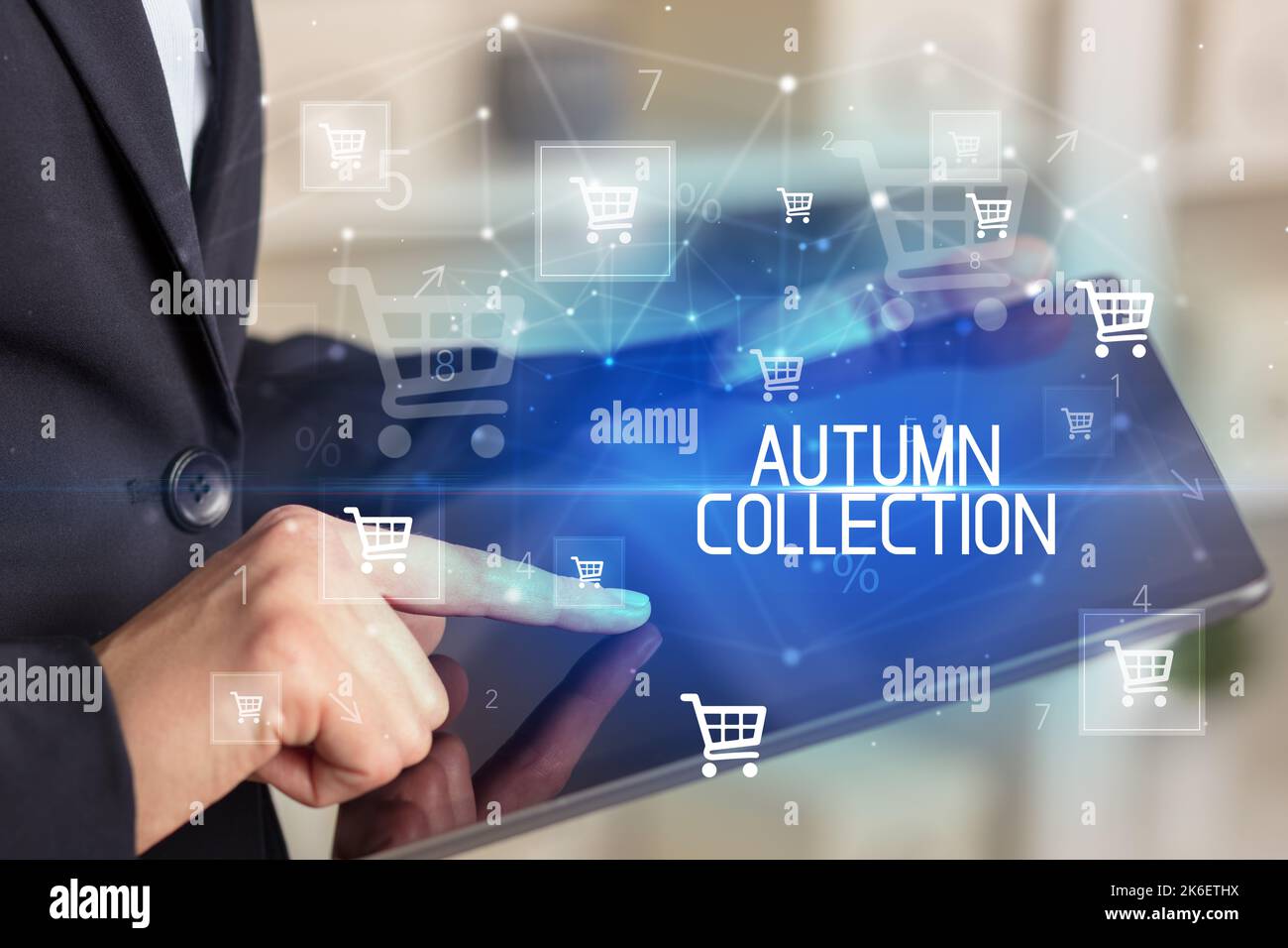 Young person makes a purchase through a tablet Stock Photo - Alamy